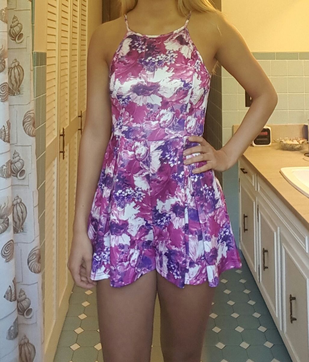 In love with this romper. Looks exactly like the photo, fabric feels ...