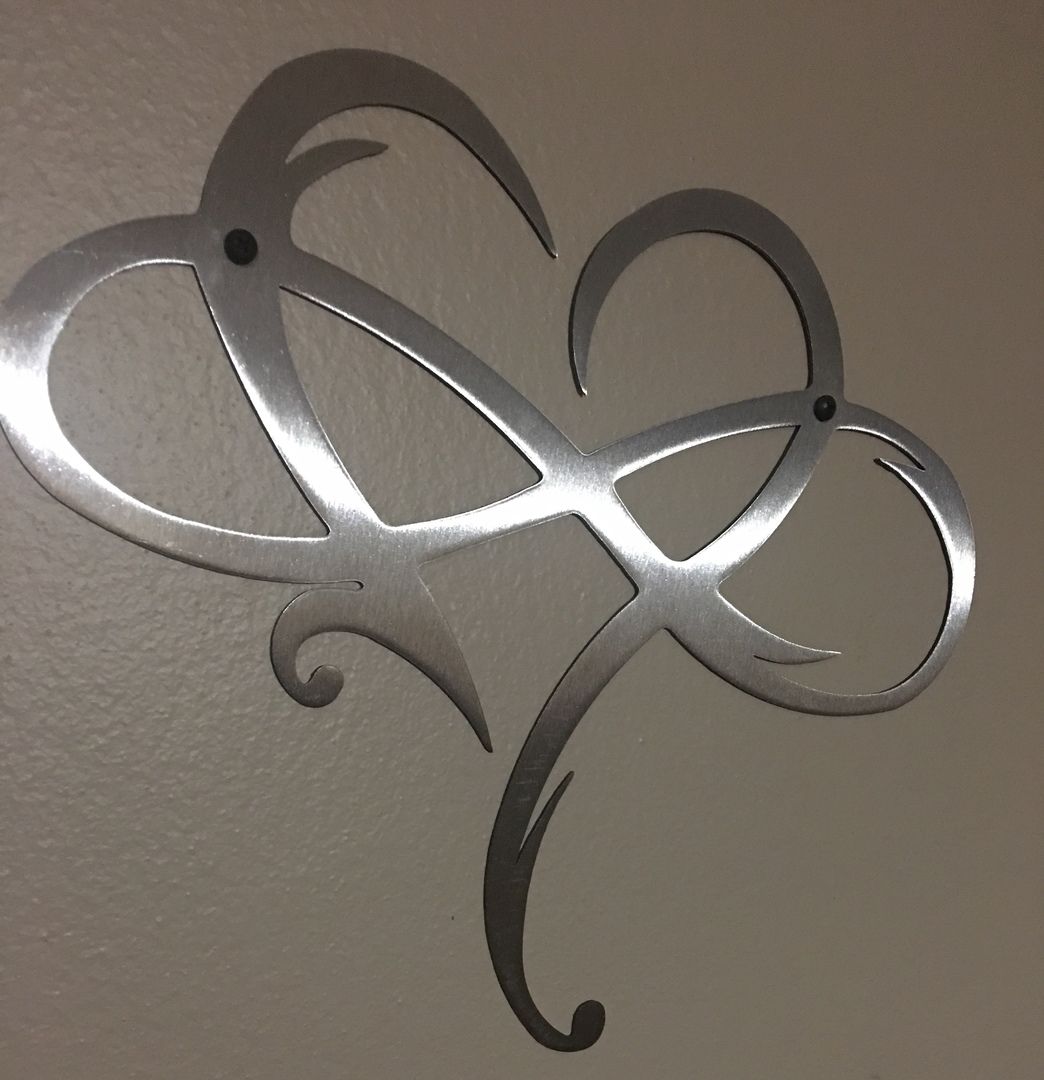 Love it! Infinite Love steel decoration - the design & craftsmanship is ...