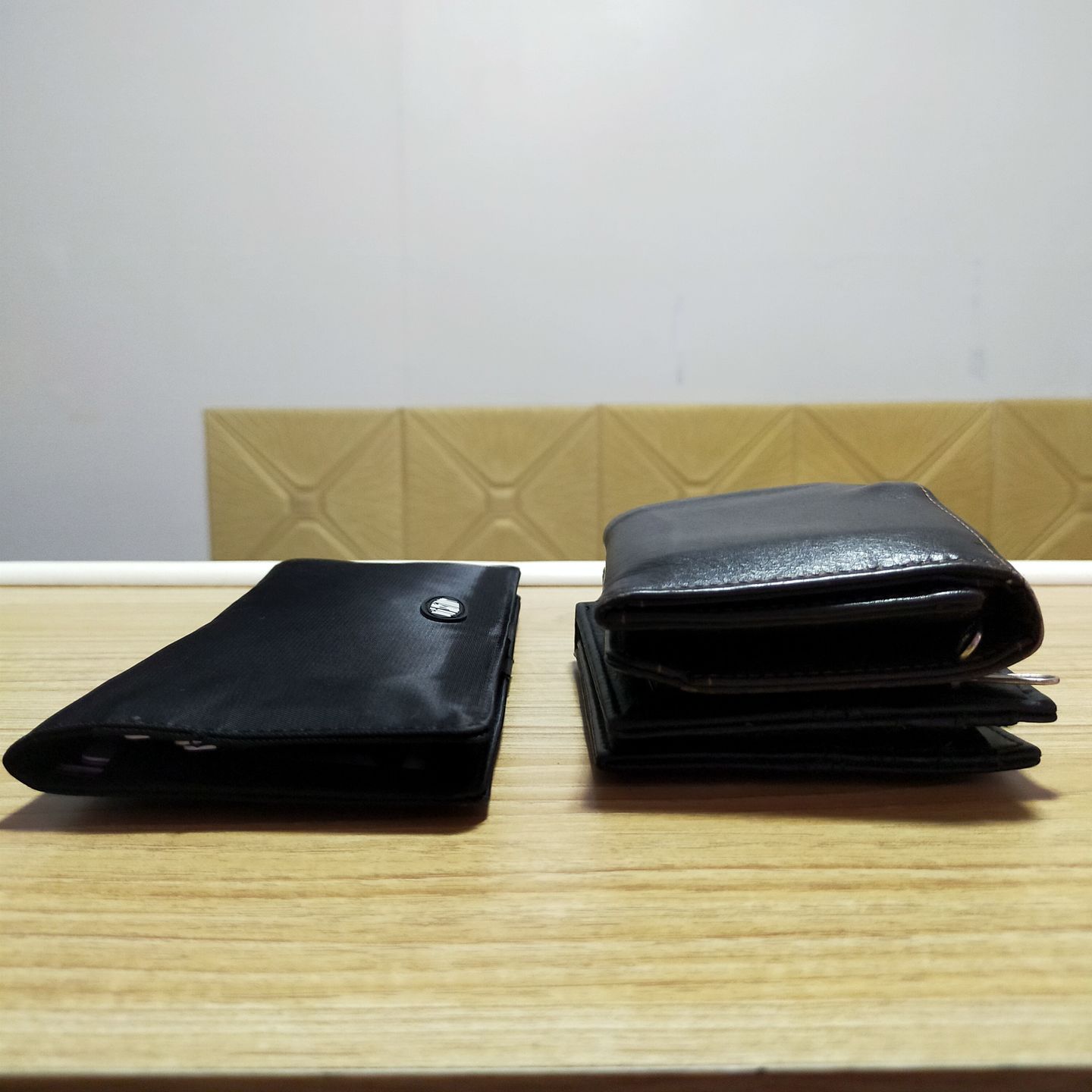 I am in awe while looking at how the contents of 2 bulky wallets fitted ...